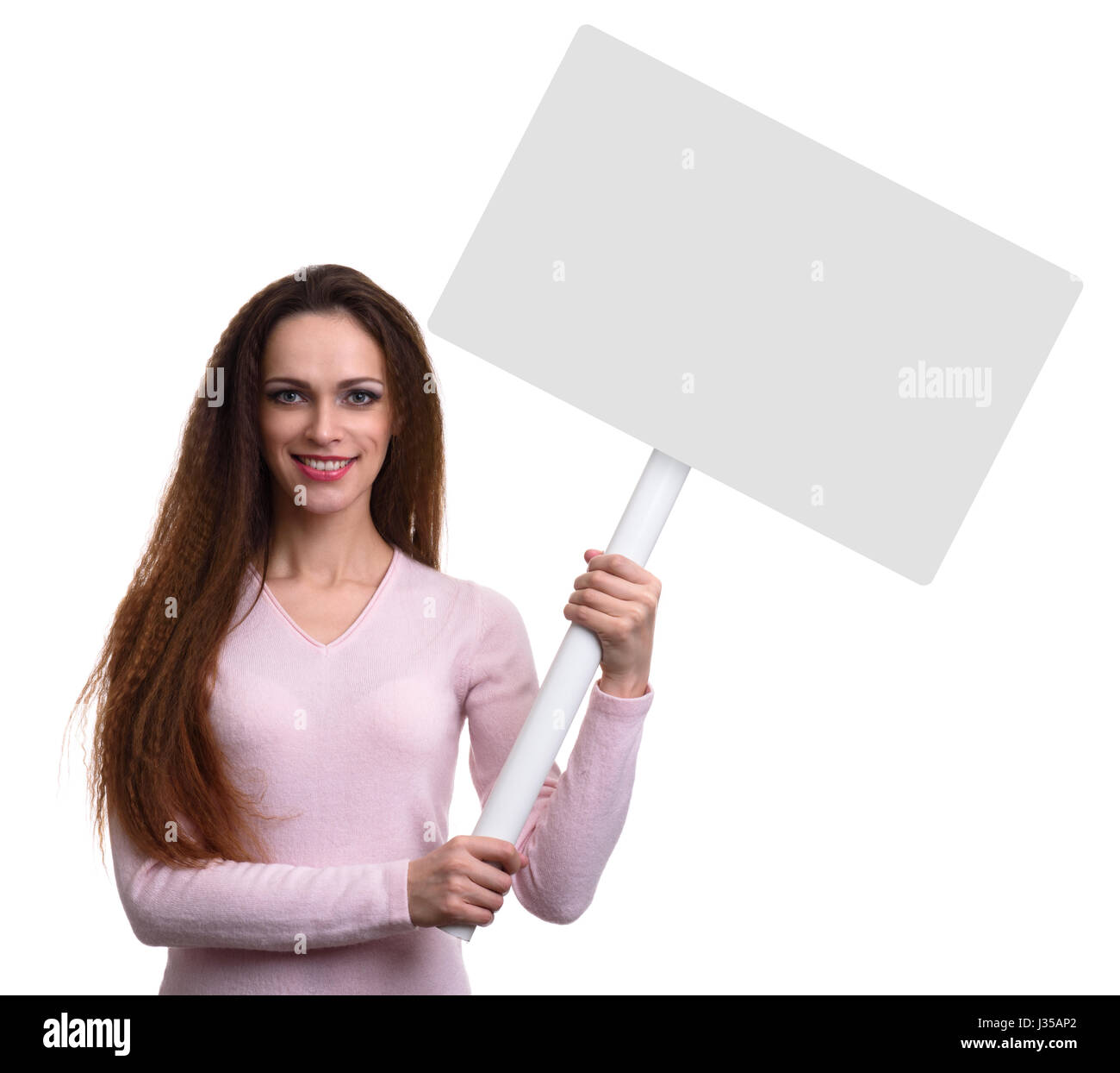casual pretty girl holds a blank placard. Isolated on white Stock Photo ...