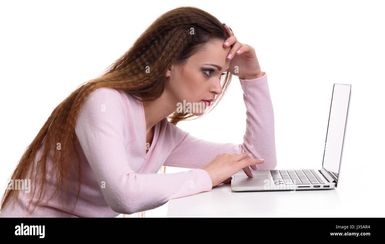 portrait of a young woman looking at laptop. Isolated Stock Photo - Alamy