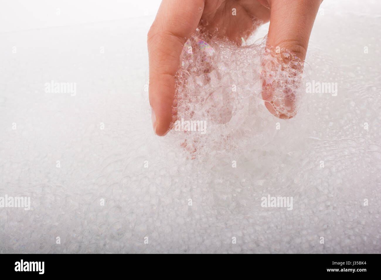 Hand washing and soap foam on a foamy background Stock Photo - Alamy