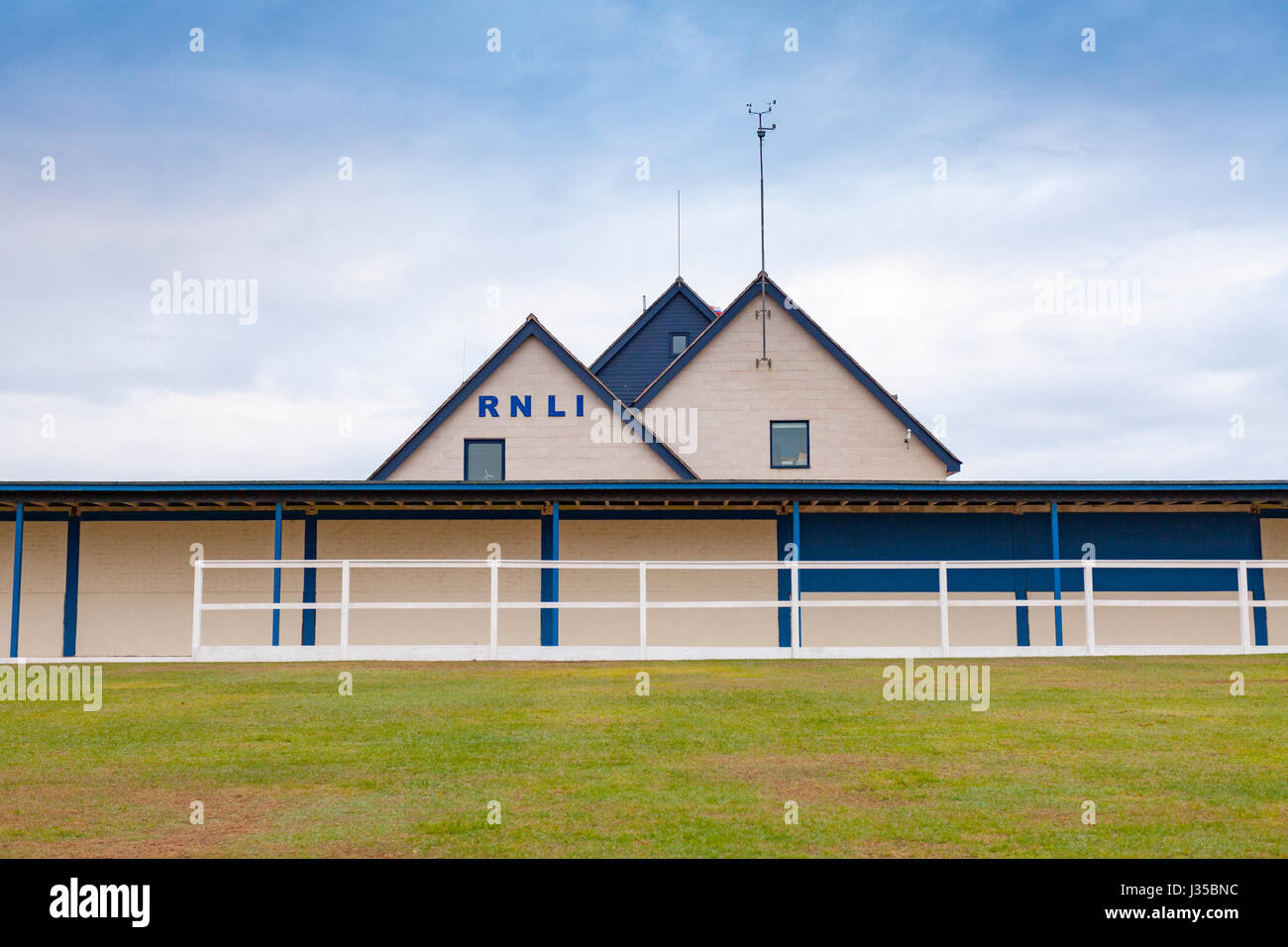 Bowling greens and RNLI lifeboat building on the promenade at the ...