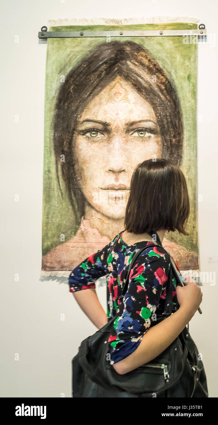 New York, NY, USA - May 3, 2017: Visitors look at artwork during ...