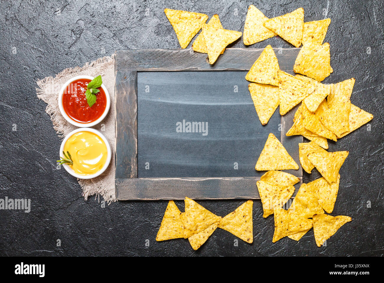 Mexican nacho with sauces and chalk board Stock Photo - Alamy