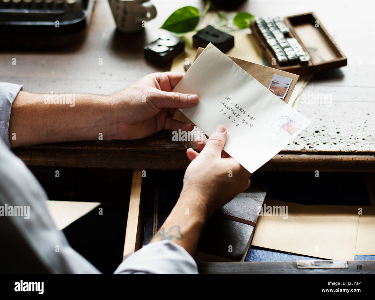 People Hands Holding Envelope Letter Communication Stock Photo - Alamy
