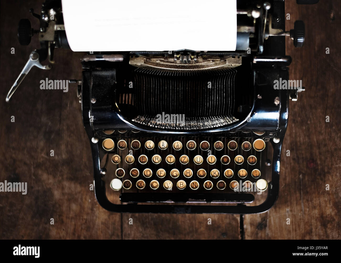 Retro Typewriter Machine Old Style with Blank Paper Stock Photo - Alamy