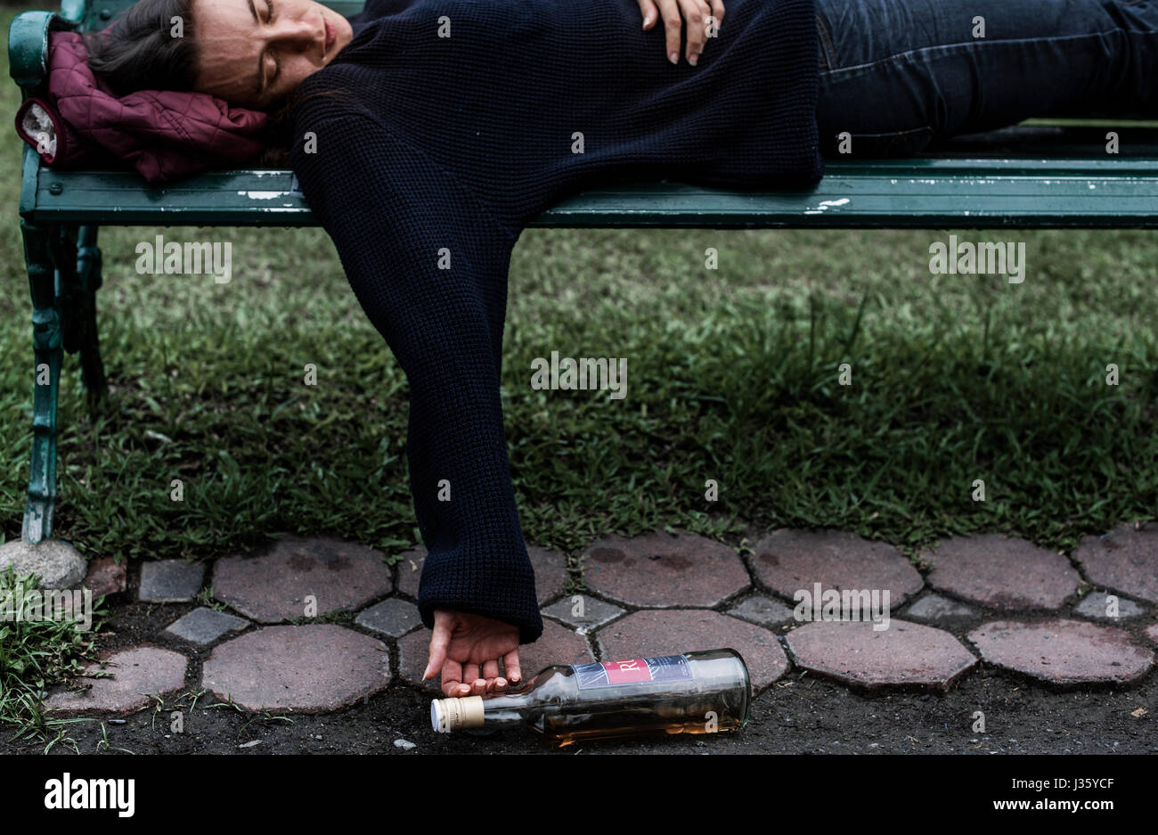 Drunk Homeless Woman In The Park Stock Photo - Alamy