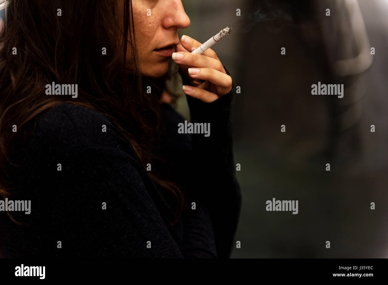 Homeless Adult Woman Smoking Cigarette Addiction Stock Photo - Alamy