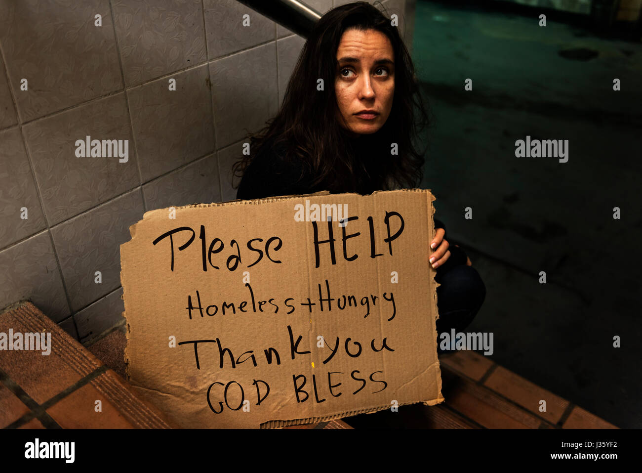Homeless Hungry Woman Asking for Help Stock Photo - Alamy
