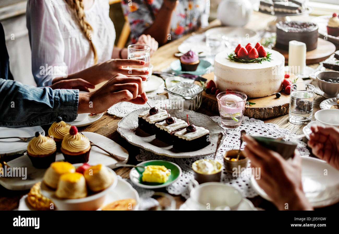 Friends Gathering Together on Tea Party Eating Cakes Enjoyment ...