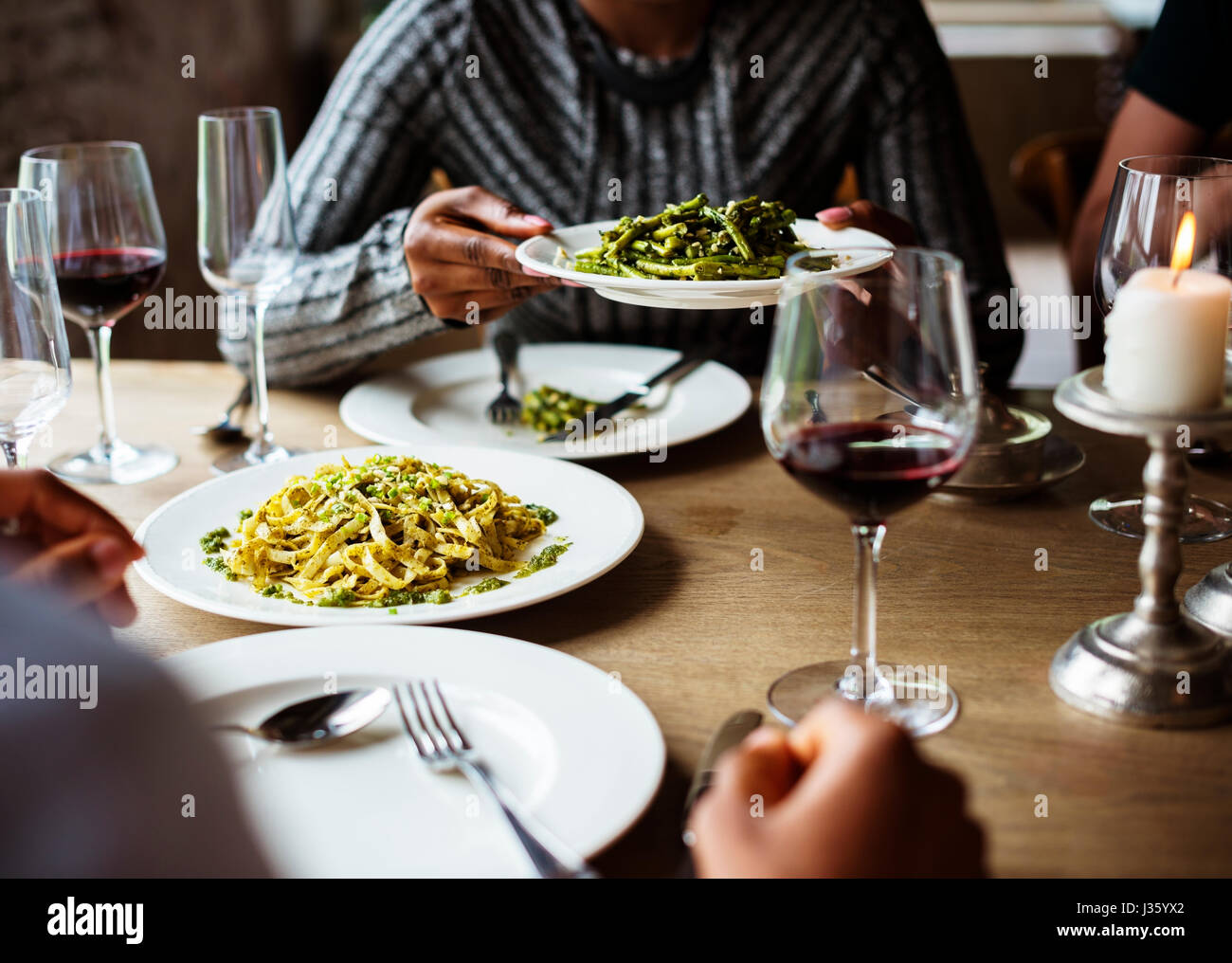 Friends Gathering Eating Food Together Happiness Stock Photo - Alamy
