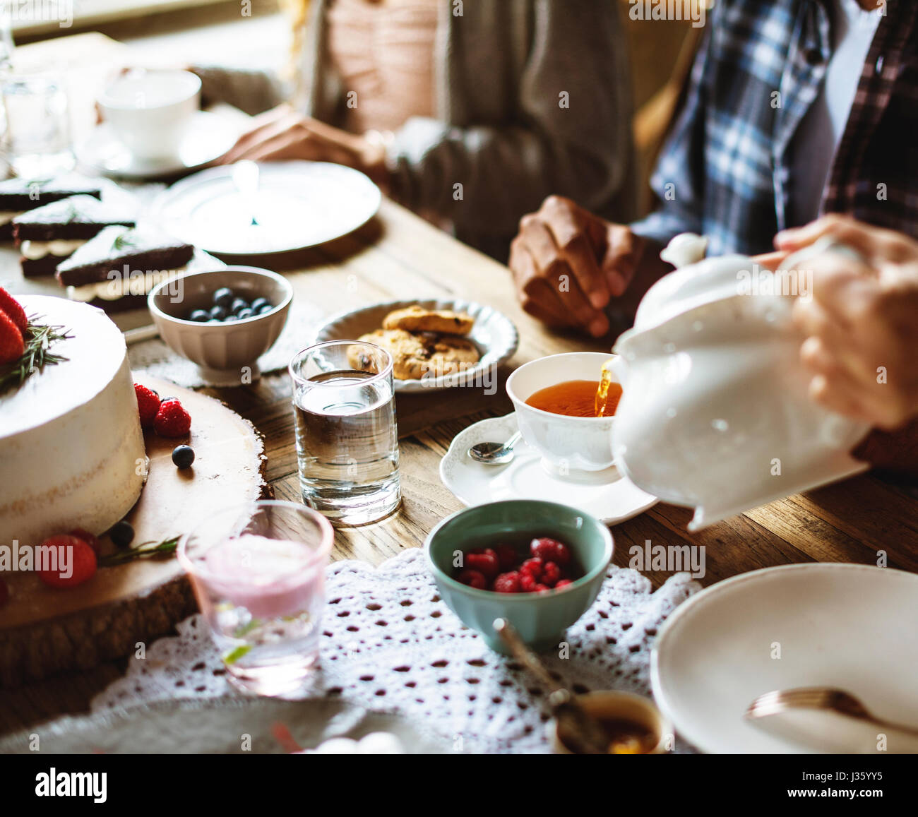 Friends Gathering Together on Tea Party Eating Cakes Enjoyment ...