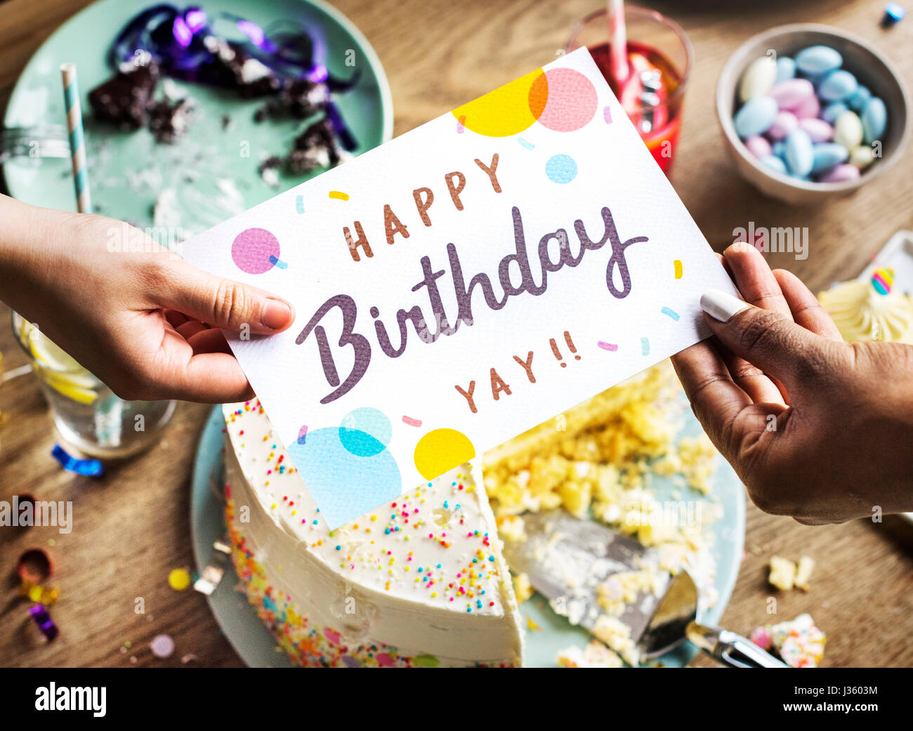 Hand Giving Birthday Wishing Card to Friend Stock Photo - Alamy