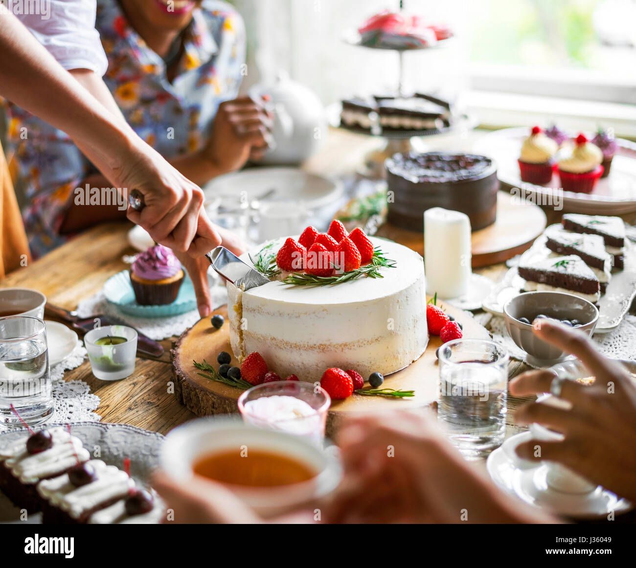Friends Gathering Together on Tea Party Eating Cakes Enjoyment ...