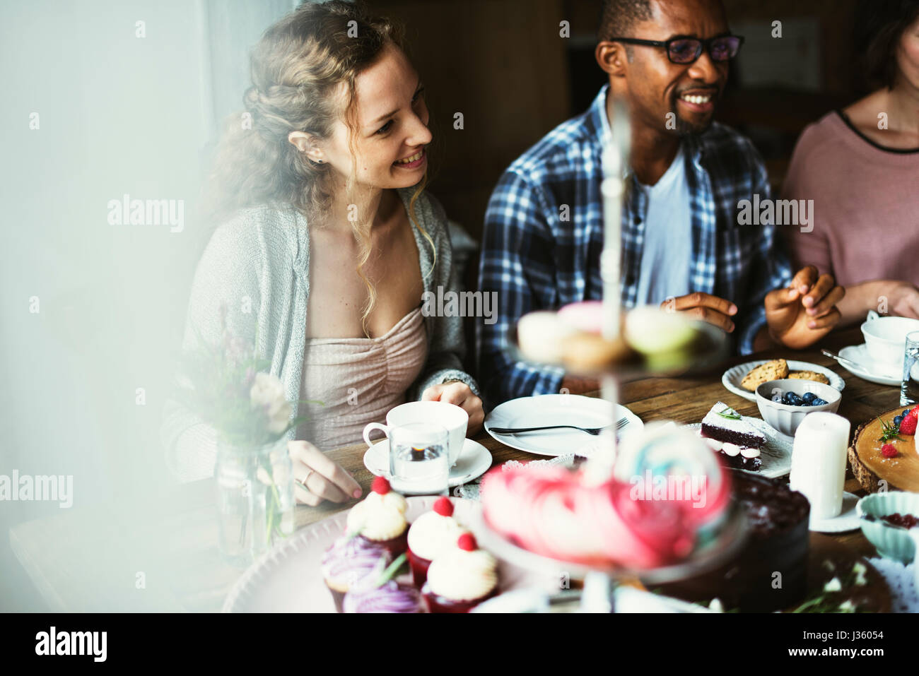 Friends Gathering Together on Tea Party Eating Cakes Enjoyment ...