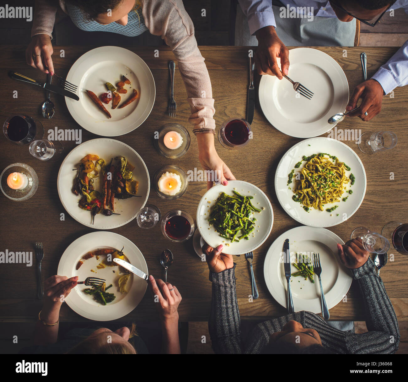 Friends Gathering Eating Food Together Happiness Stock Photo - Alamy