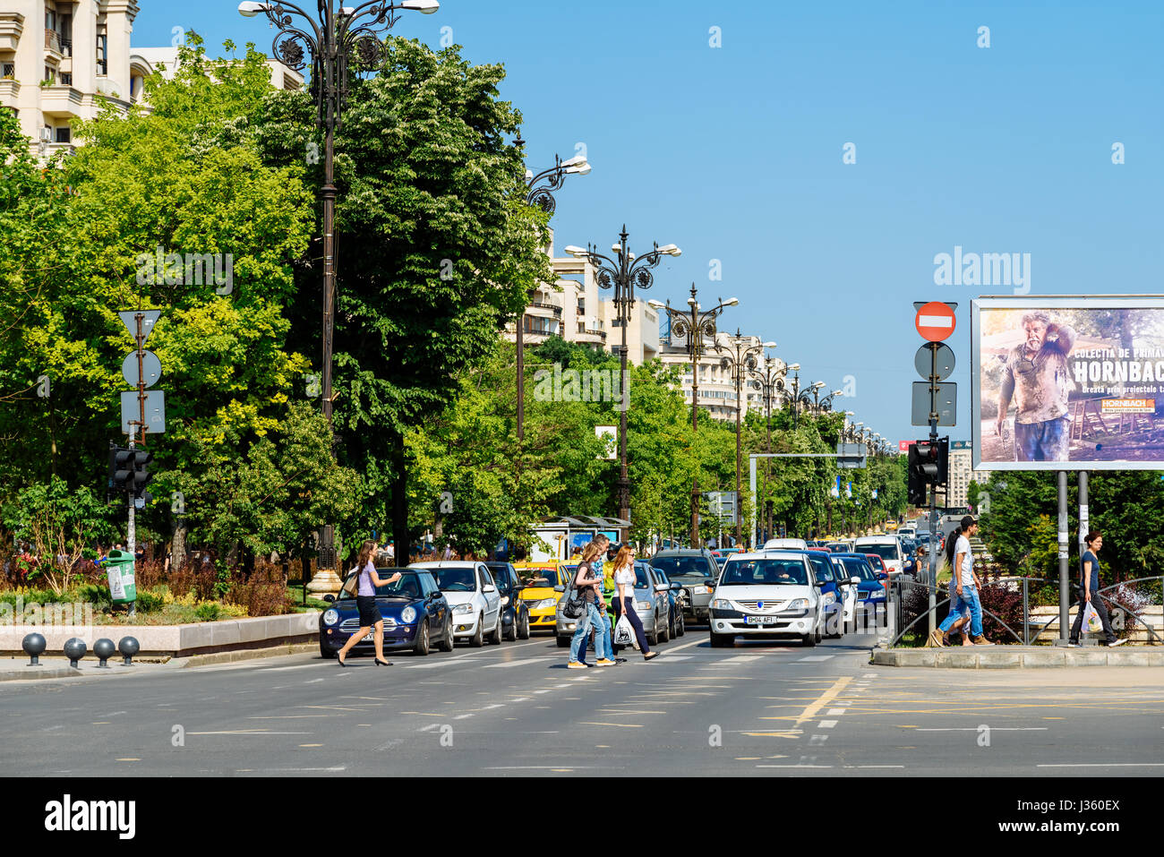 BUCHAREST, ROMANIA - MAY 19, 2015: Cars Waiting At Traffic Light For ...