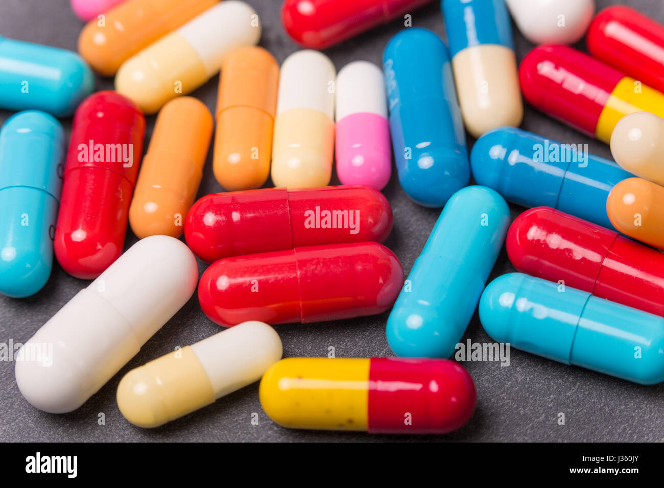 different Tablets pills capsule heap mix therapy drugs Stock Photo - Alamy