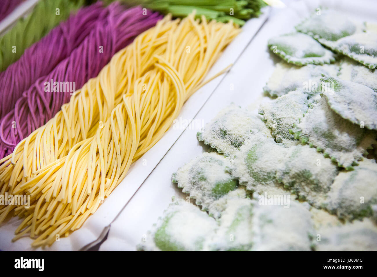 Various mix of fresh italian homemade color pasta and ravioli Stock ...