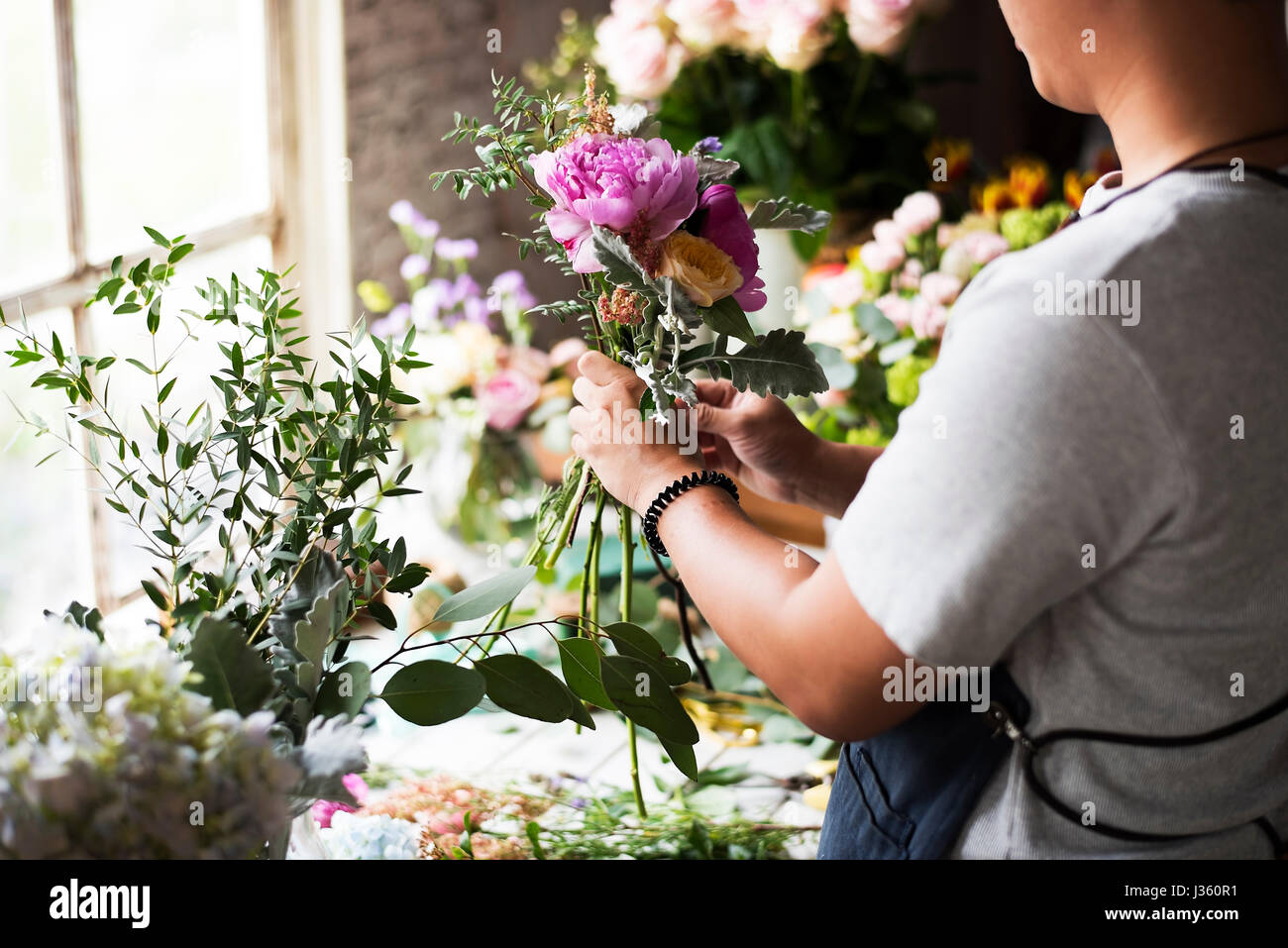 Florist Making Fresh Flowers Bouquet Arrangement Stock Photo - Alamy