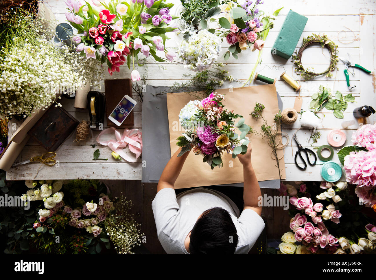 Florist Making Fresh Flowers Bouquet Arrangement Stock Photo - Alamy
