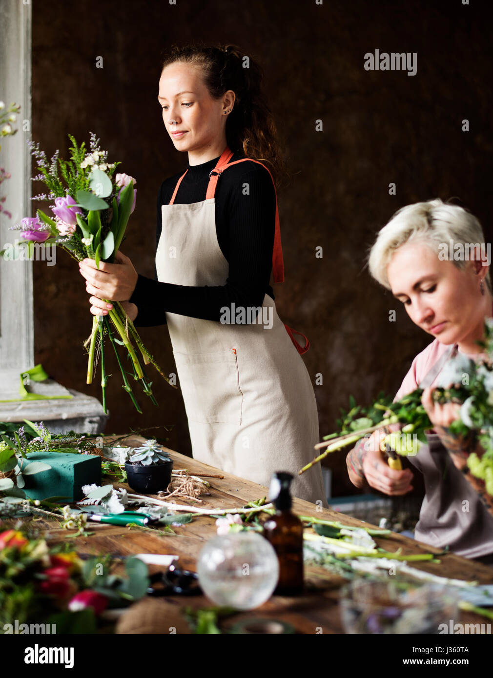 Florist Making Fresh Flowers Bouquet Arrangement Stock Photo - Alamy