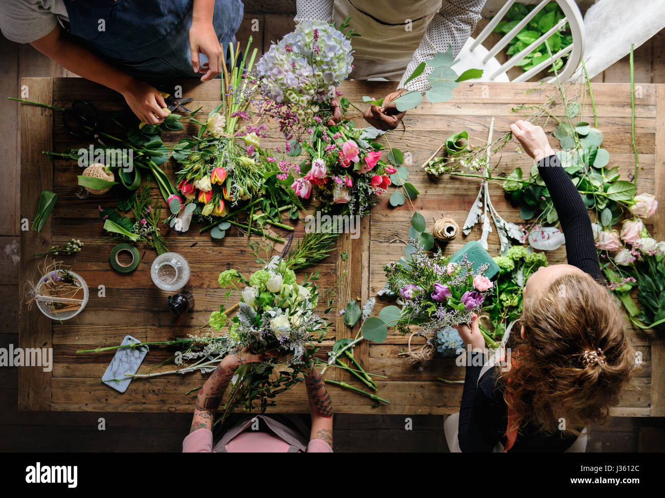 Florist Making Fresh Flowers Bouquet Arrangement Stock Photo - Alamy