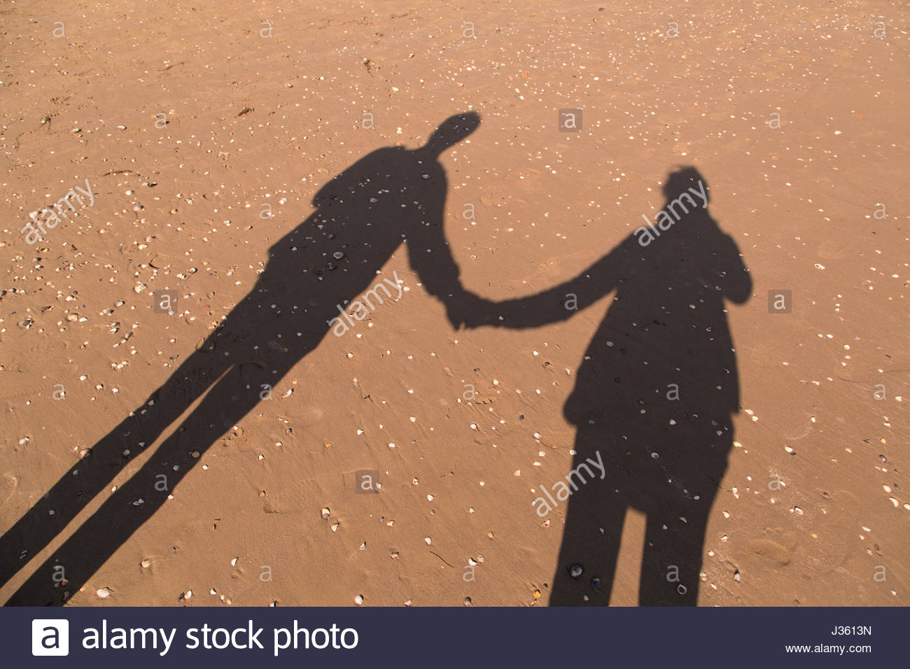 Couple Romantic Hand Holding Shadow Stock Photos & Couple Romantic Hand ...