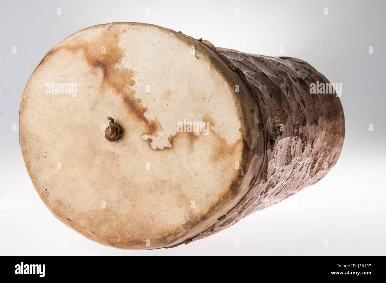 Handmade african instrument, wooden drum, isolated on white background ...