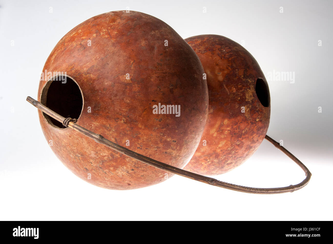 African handmade instrument, blowing, isolated on white background ...