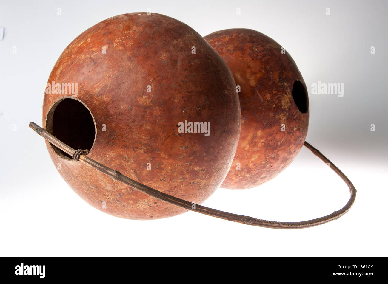 African handmade instrument, blowing, isolated on white background ...