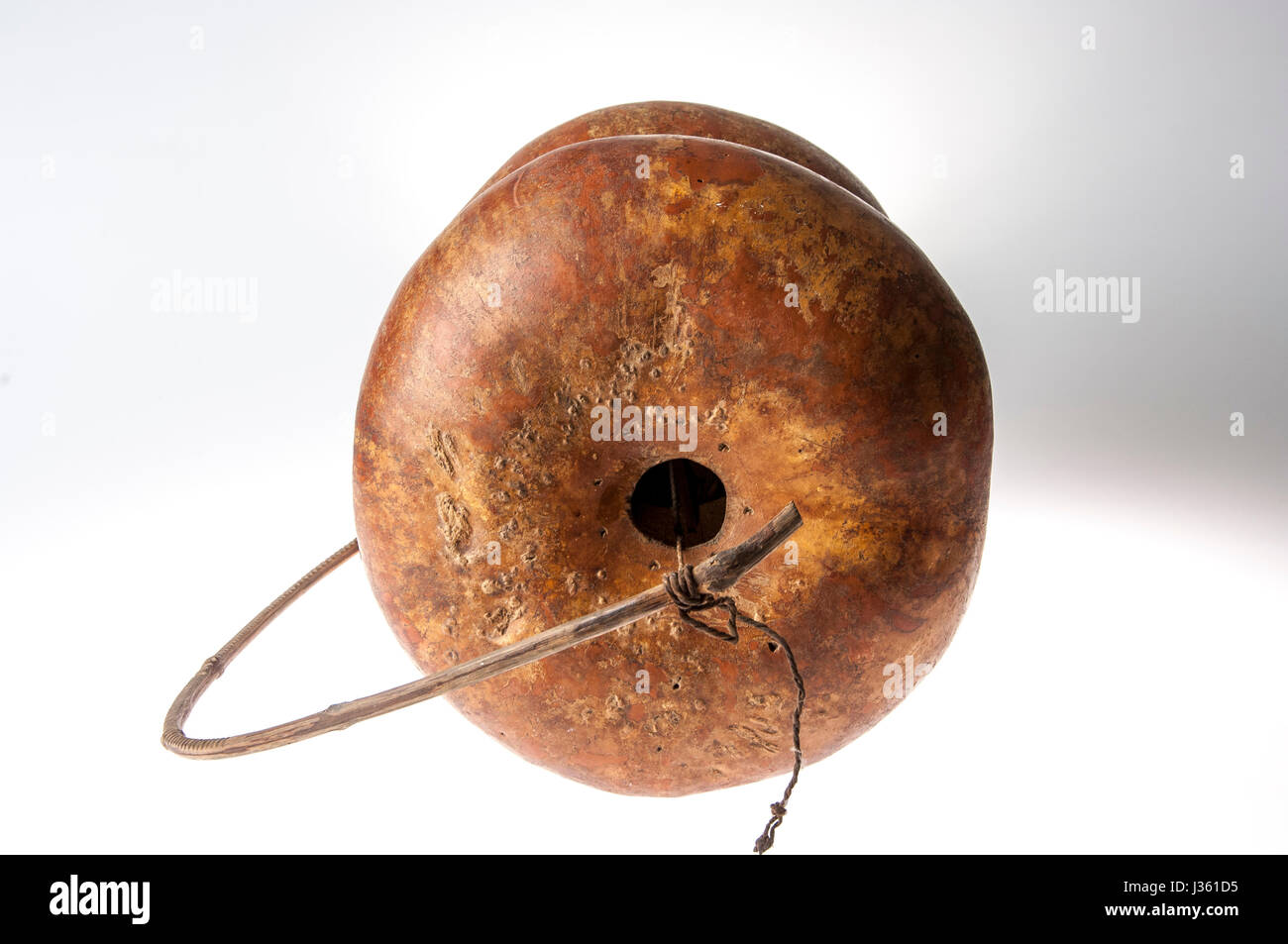 African handmade instrument, blowing, isolated on white background ...