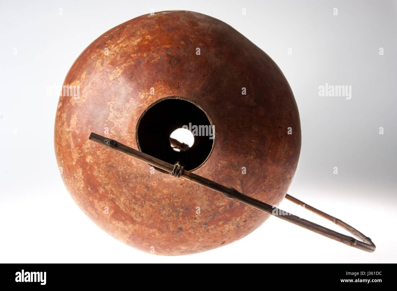 African handmade instrument, blowing, isolated on white background ...