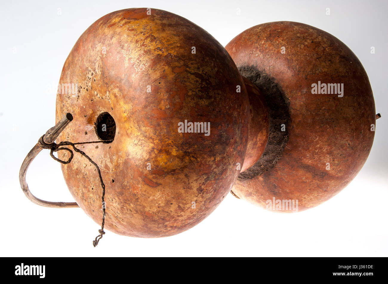 African handmade instrument, blowing, isolated on white background ...