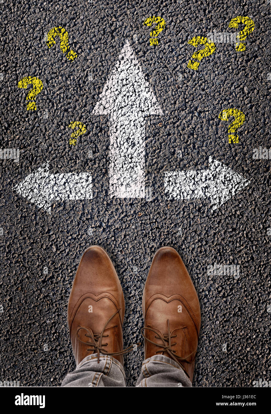 feet on a road with arrows and question marks Stock Photo - Alamy