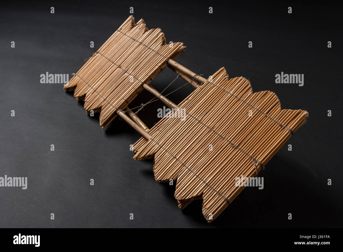 Hand made african instrument, wooden pipes, isolated on black ...