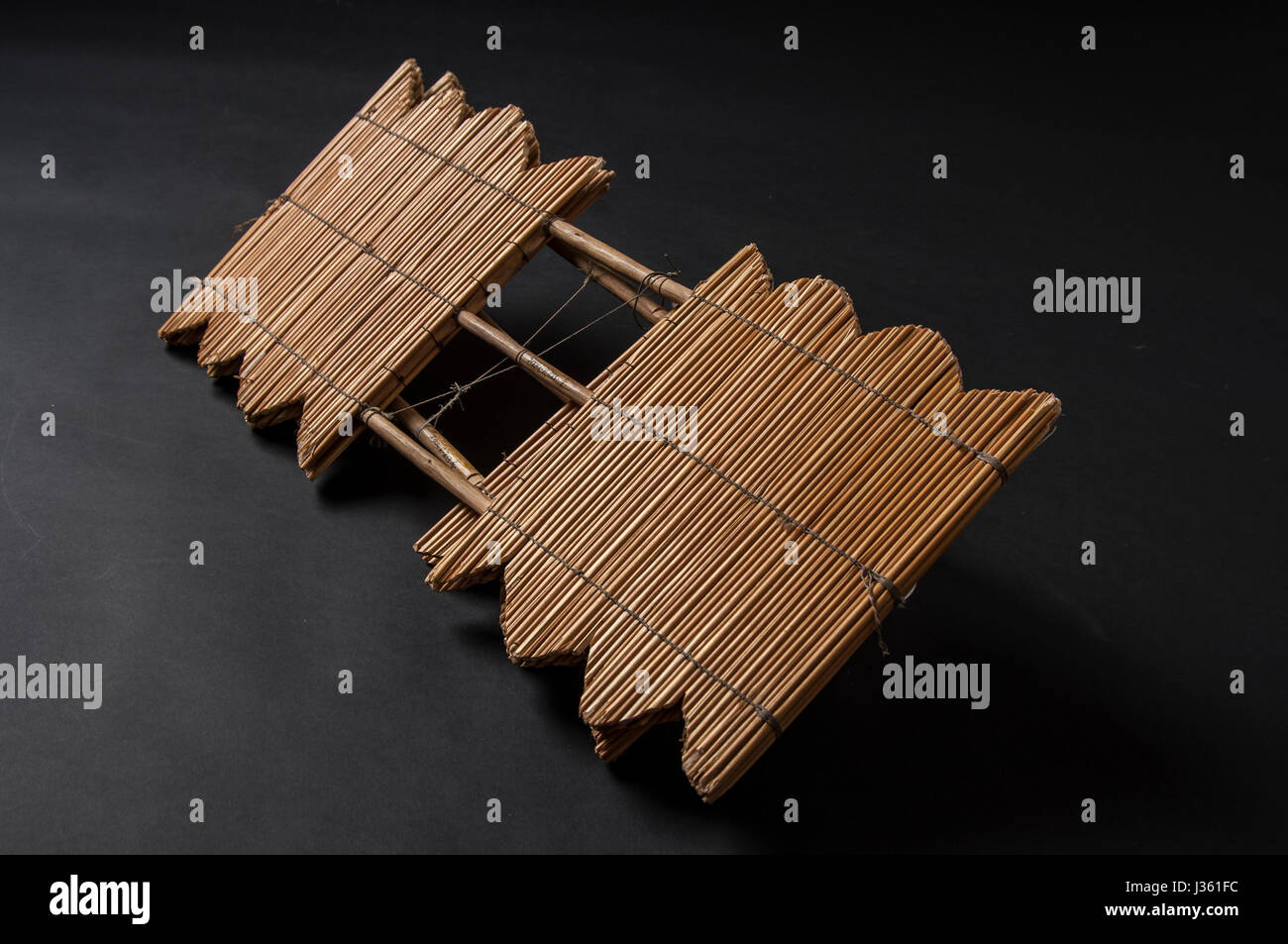Hand made african instrument, wooden pipes, isolated on black ...