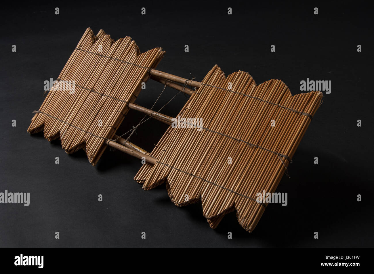 Hand made african instrument, wooden pipes, isolated on black ...