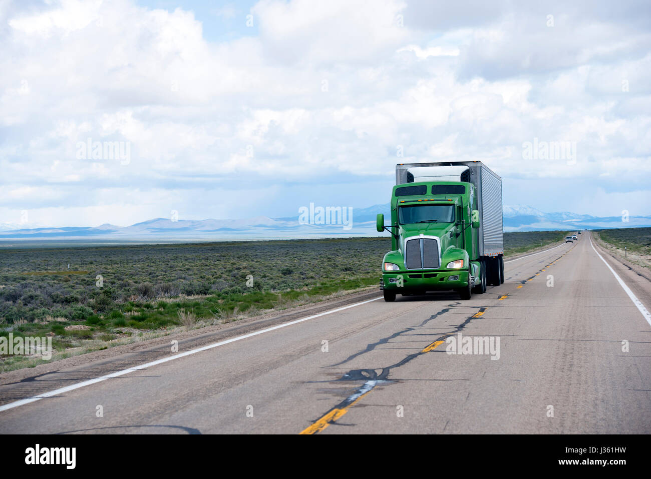 Stylish professional powerful green big rig semi truck with a trailer ...