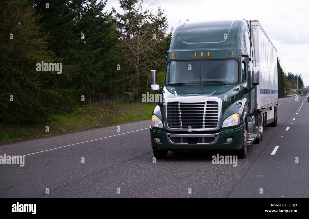 Elegant powerful semi truck with high cab for rest during long distance ...