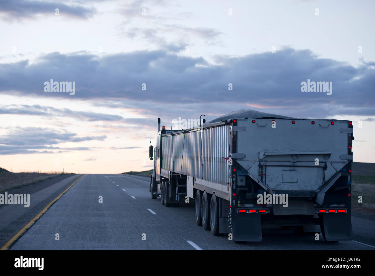 The long professional model in the American big rig semi truck with a ...
