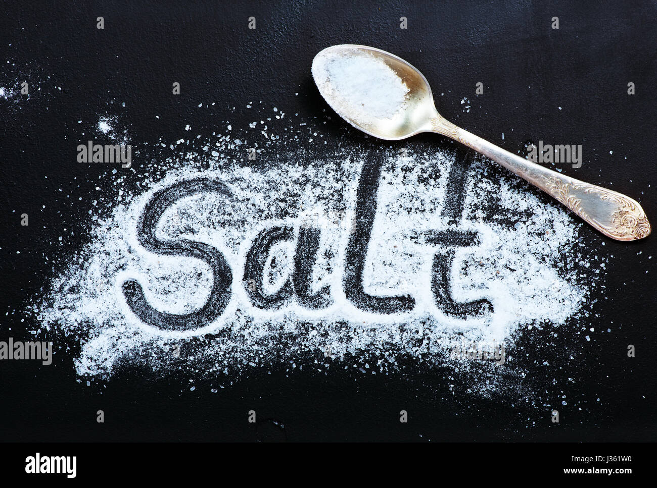salt on a table, white sea salt Stock Photo - Alamy