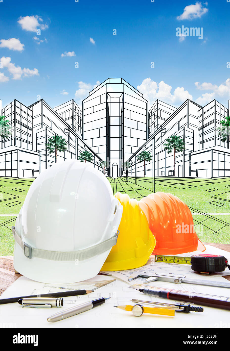 architect working table with writiing tool safety helmet and ...