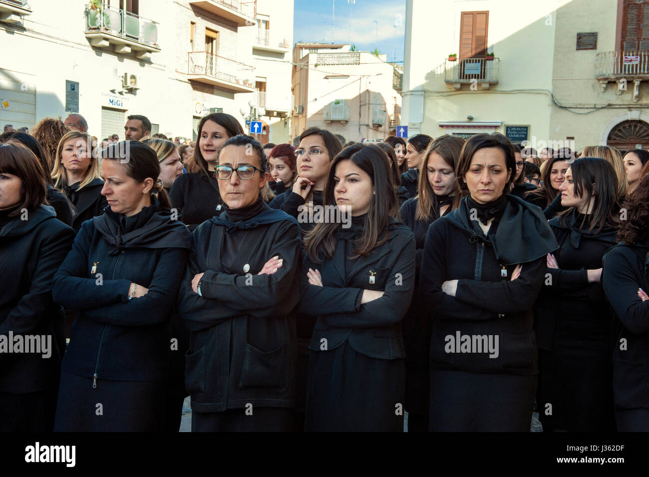 The women in black who will take part to the procession of Madonna ...