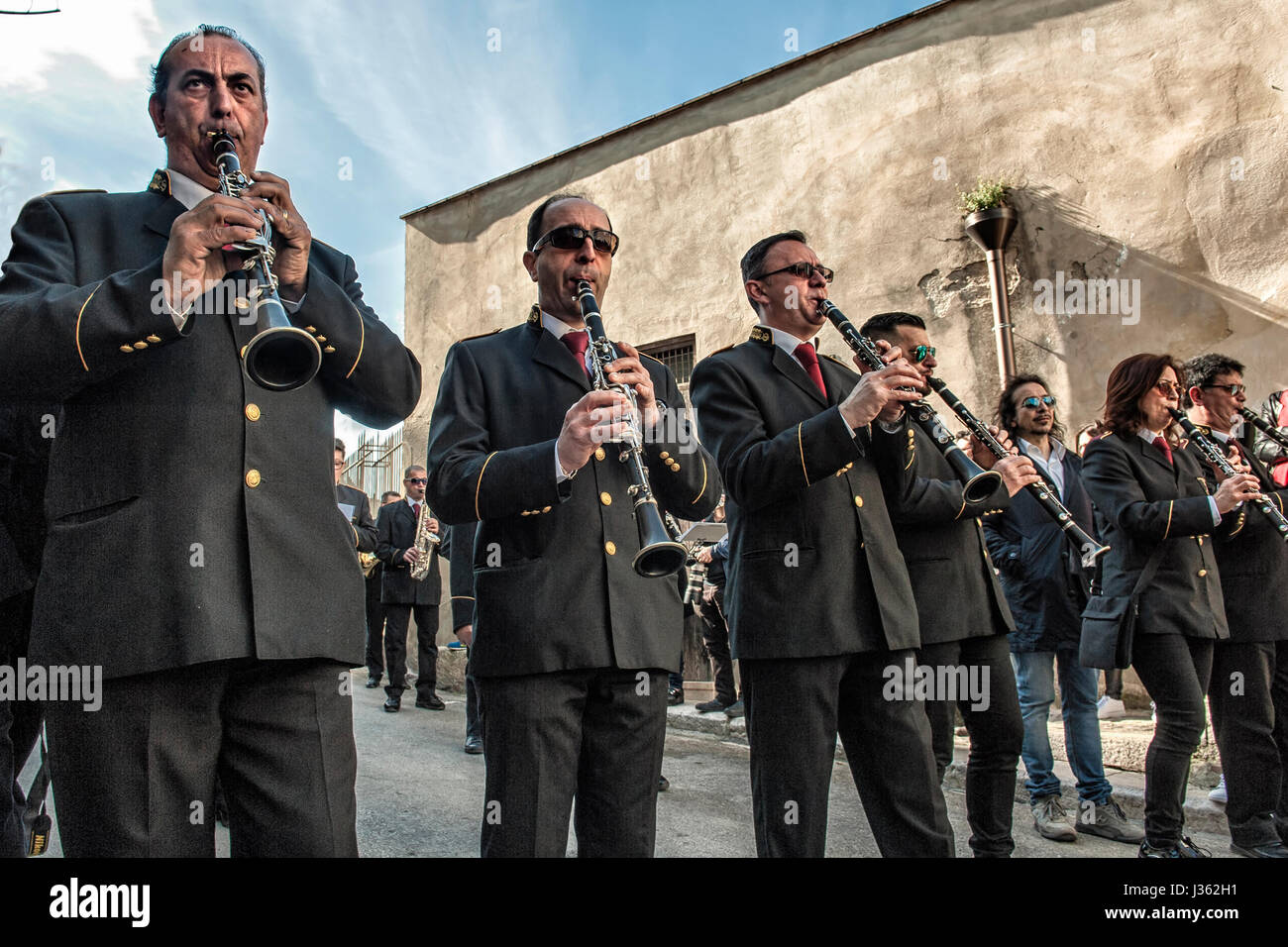 The band playing the harsh musical theme that the women in black sing ...