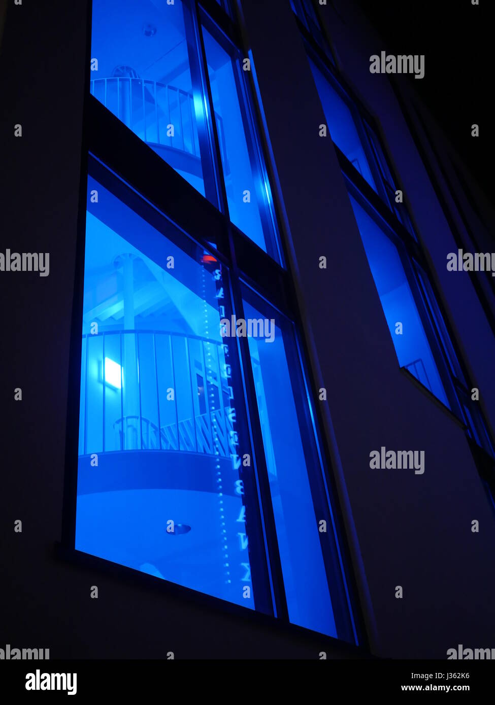 blue illuminated windows Stock Photo - Alamy