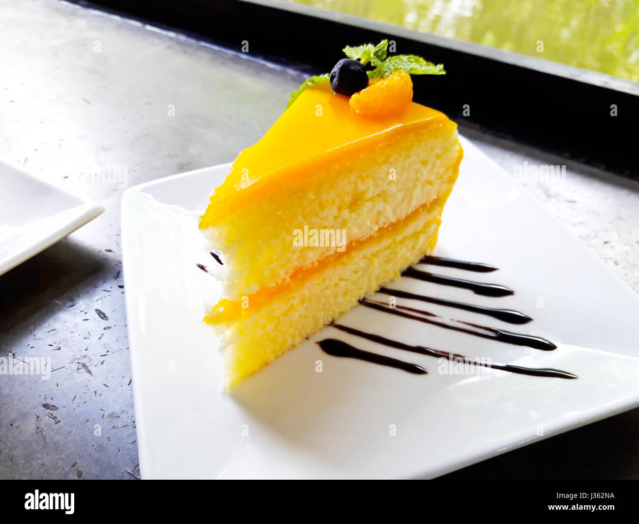 Beautiful orange dessert cake hi-res stock photography and images - Alamy
