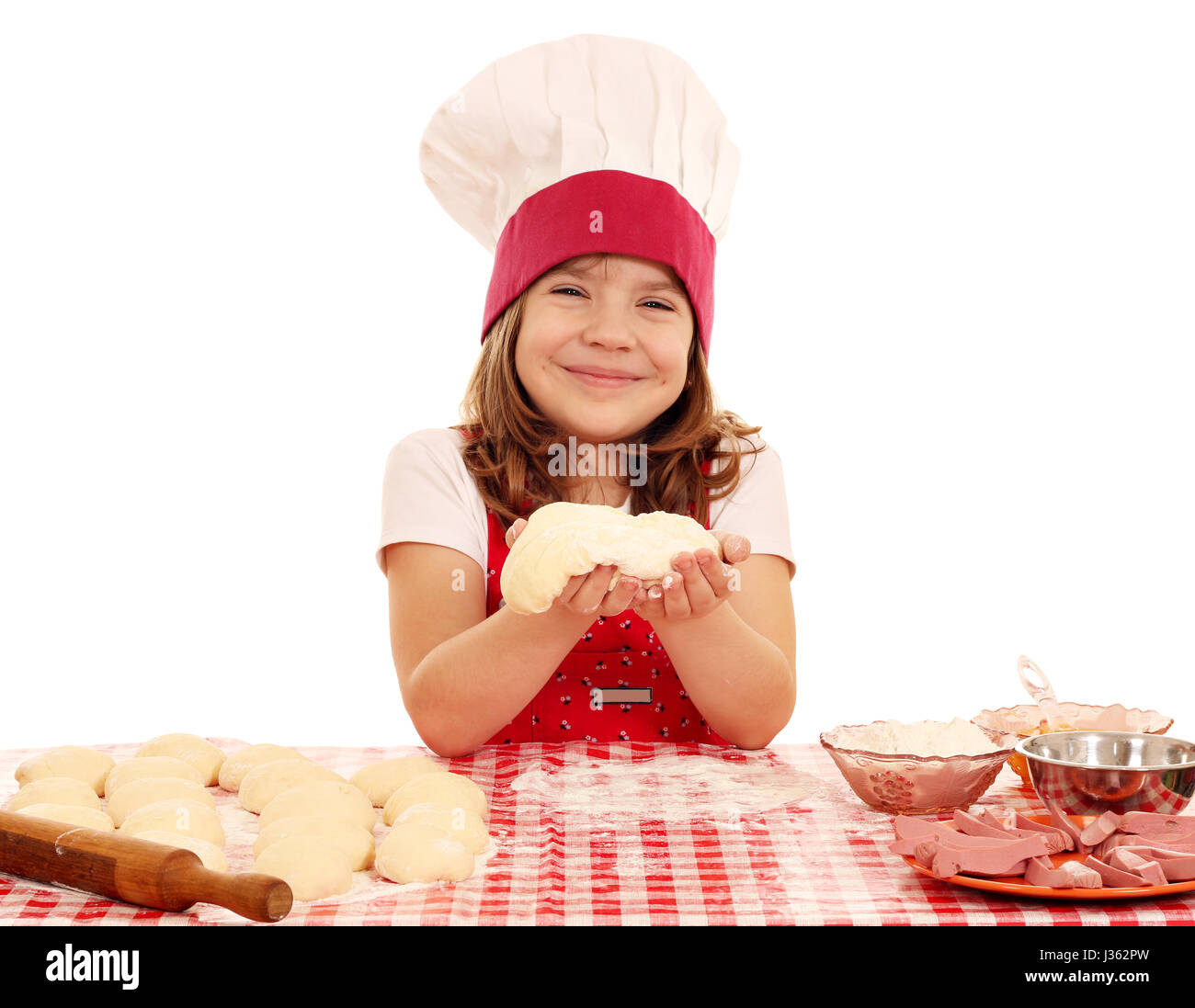 happy little girl cook with dough Stock Photo - Alamy