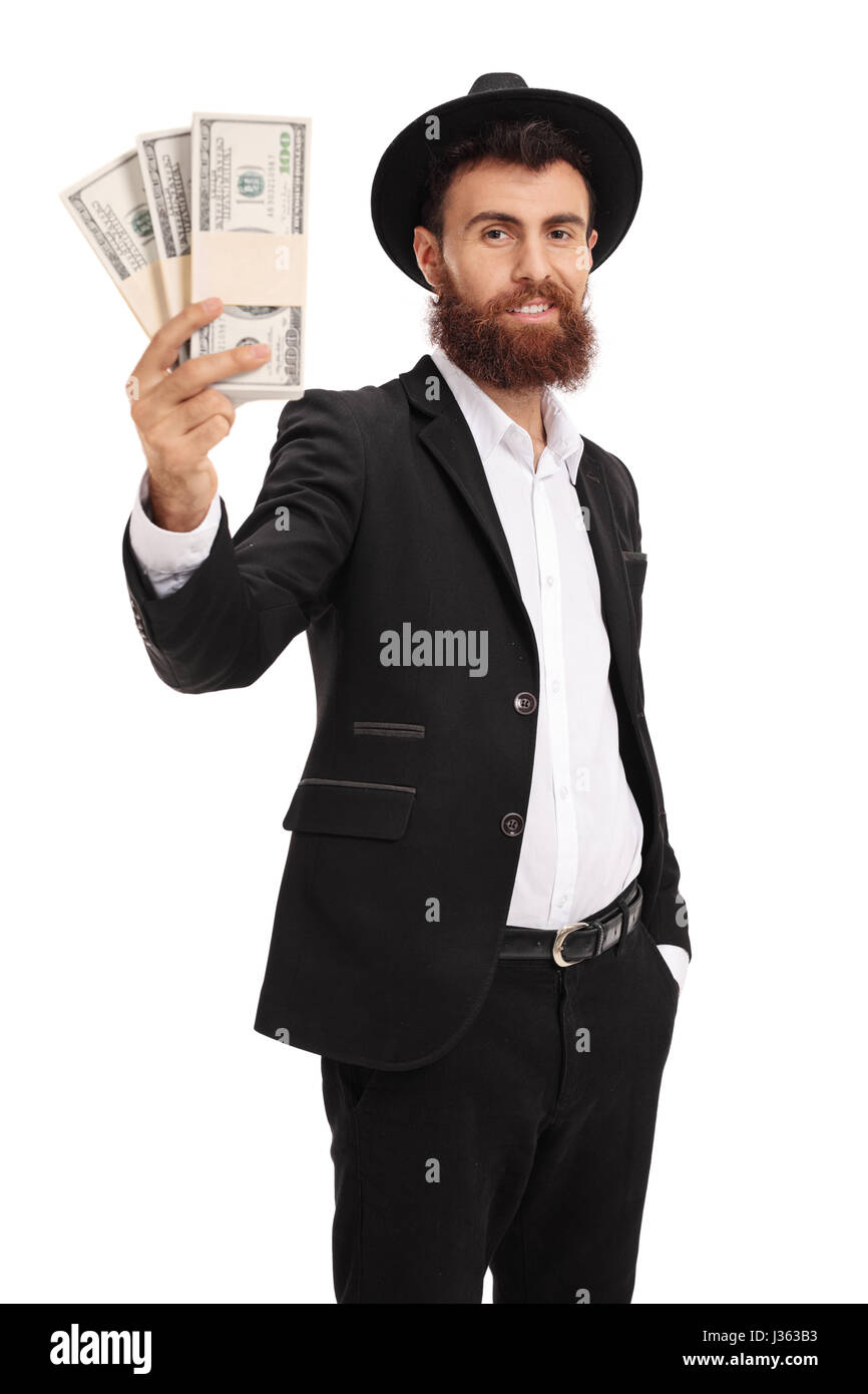 Handsome bearded man holding a money bundle isolated on white ...