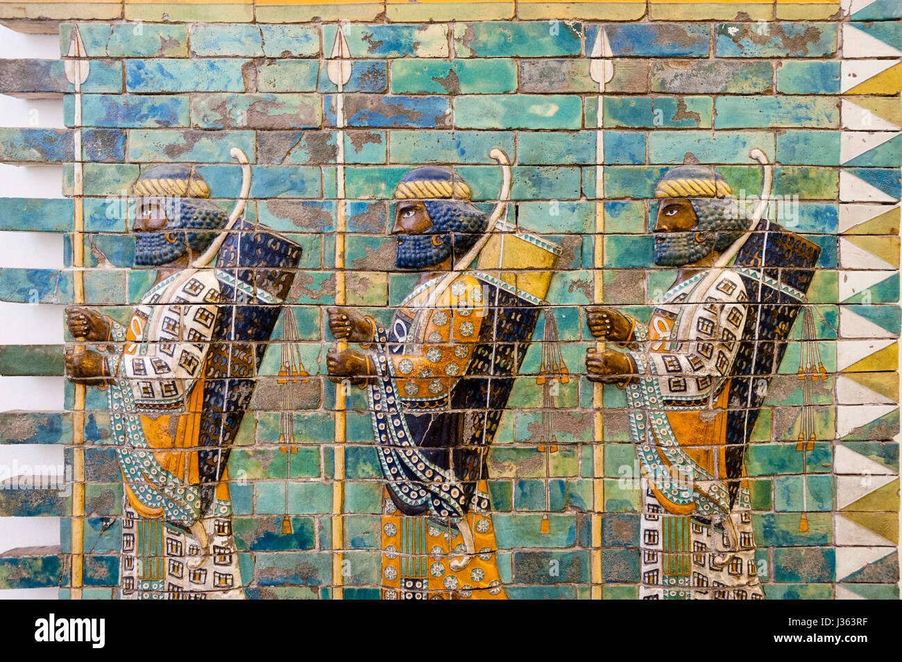 Detail of Ancient Assyrian ceramic frieze at the Pergamon Museum on ...