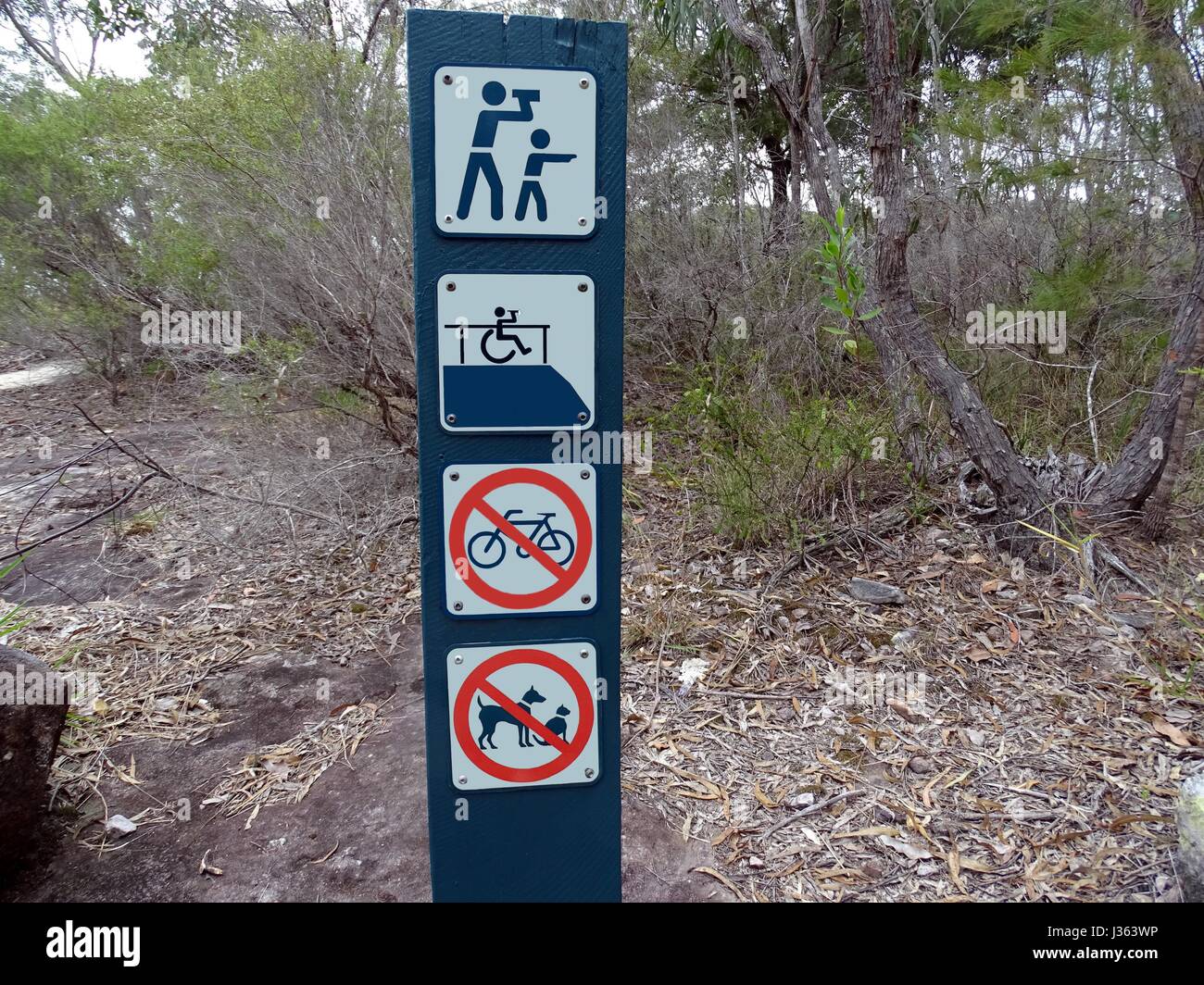 Information sign in a park Stock Photo - Alamy