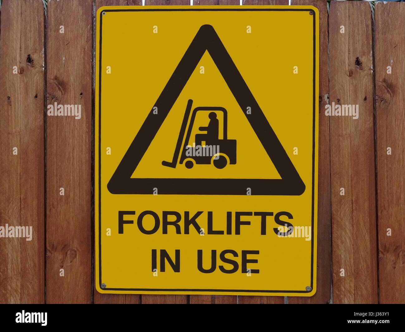 A danger warning sign Stock Photo - Alamy